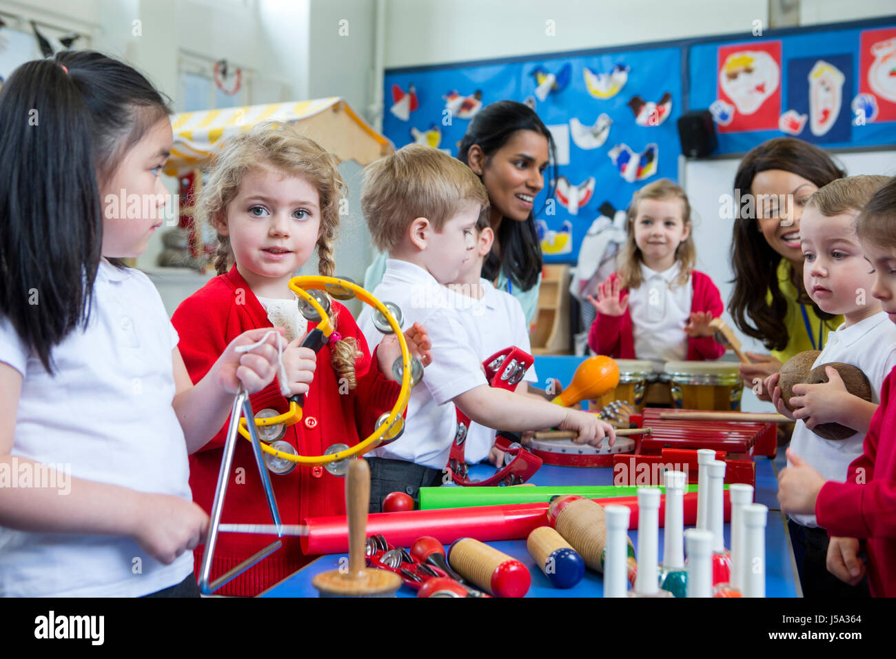 Children playing musical instruments High Resolution Stock Photography ...