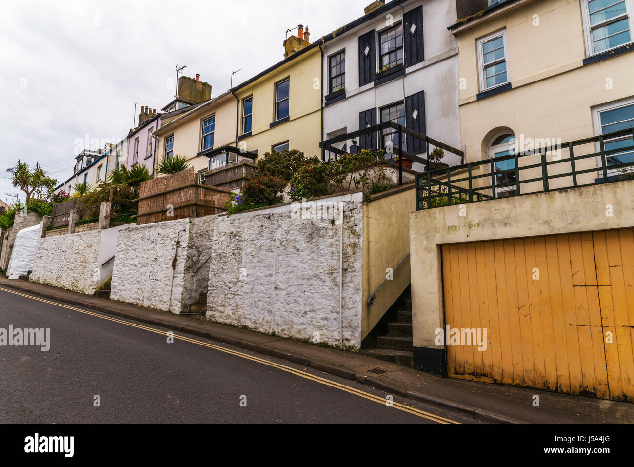 Typical English architecture, residential buildings in a row along the ...