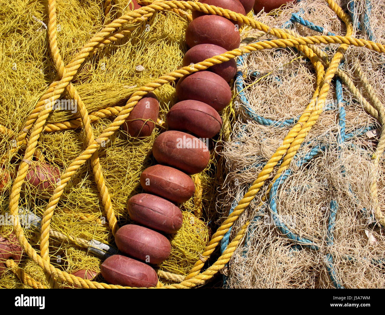 harbor net harbours fisherman ropes cord orange salt water sea ocean ...