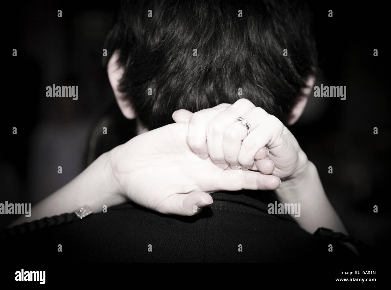 Hands round neck hi-res stock photography and images - Alamy