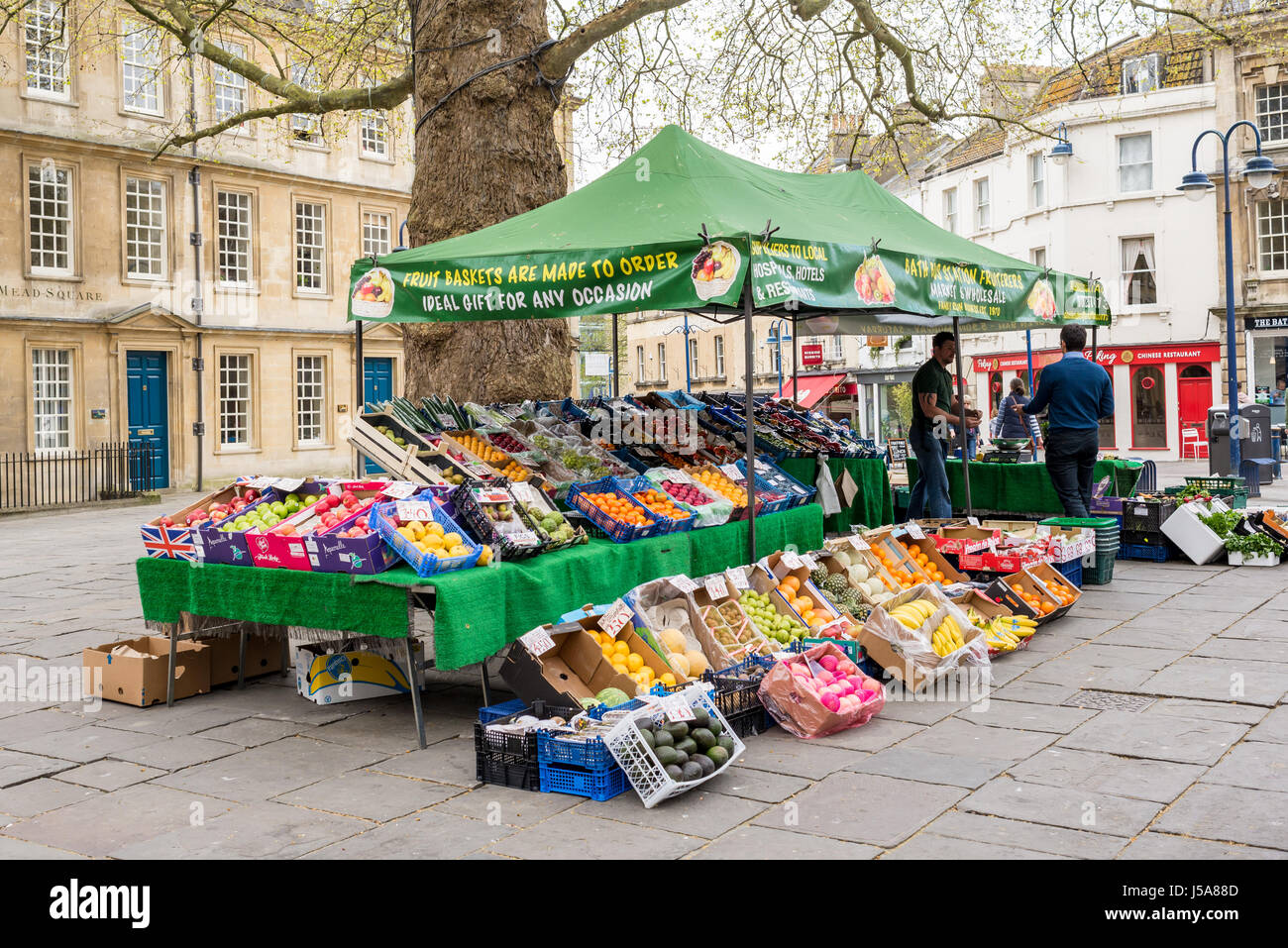 Fruit and vegetables stand or stall with a wide selection of products ...