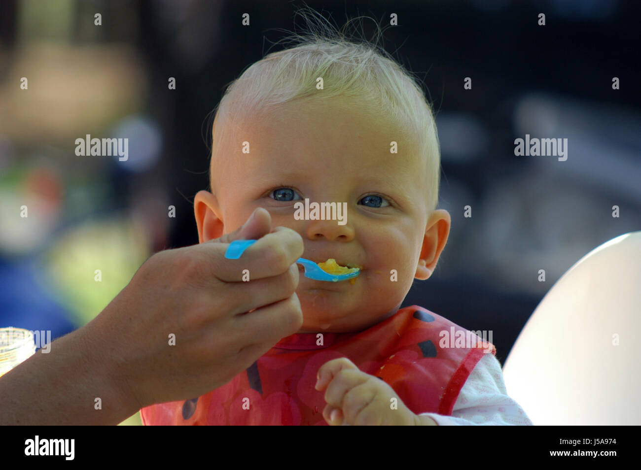 bebe eat at Stock Photo - Alamy