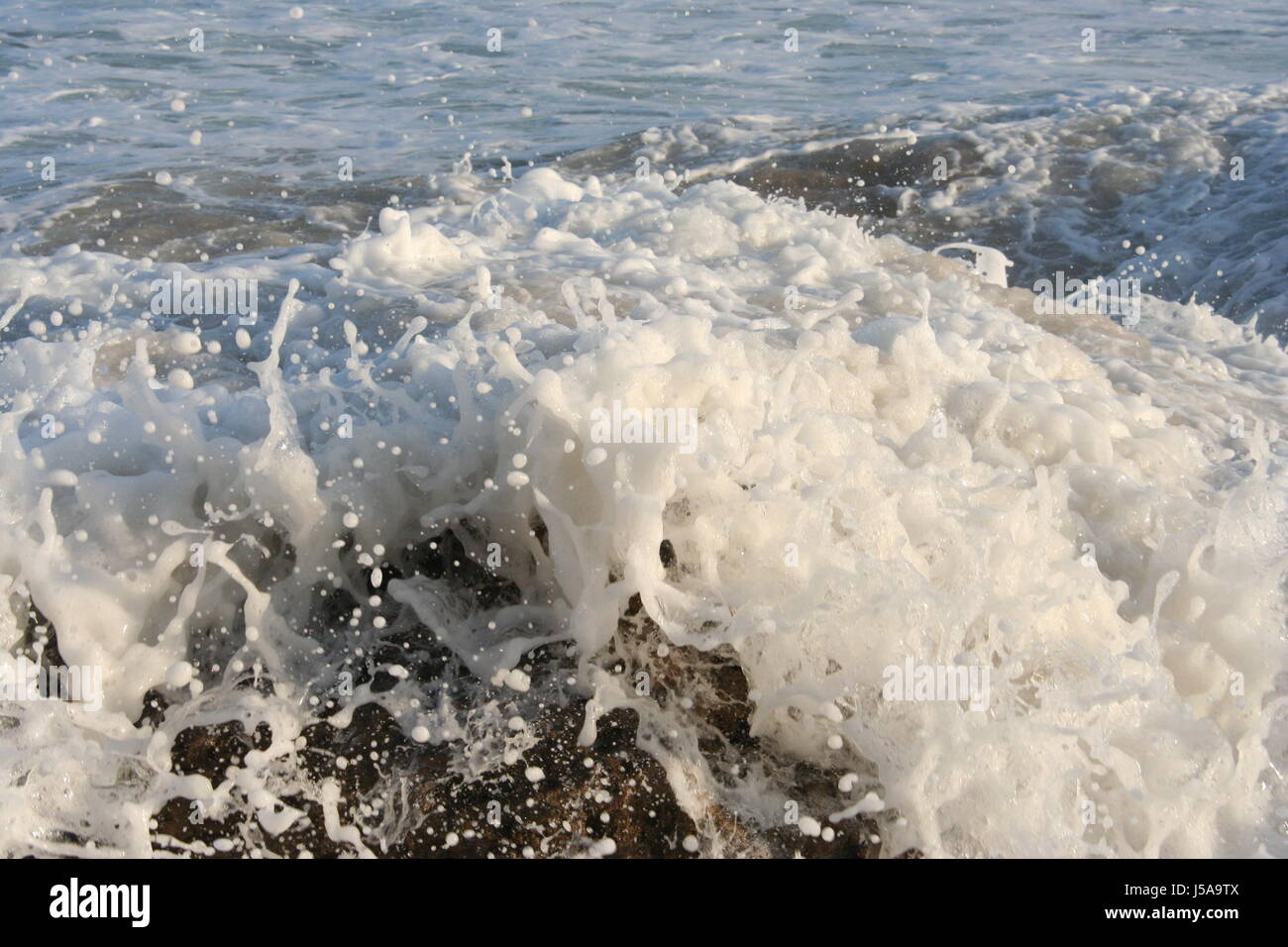 waves rock surf spray salt water sea ocean water foam drop drip drops ...