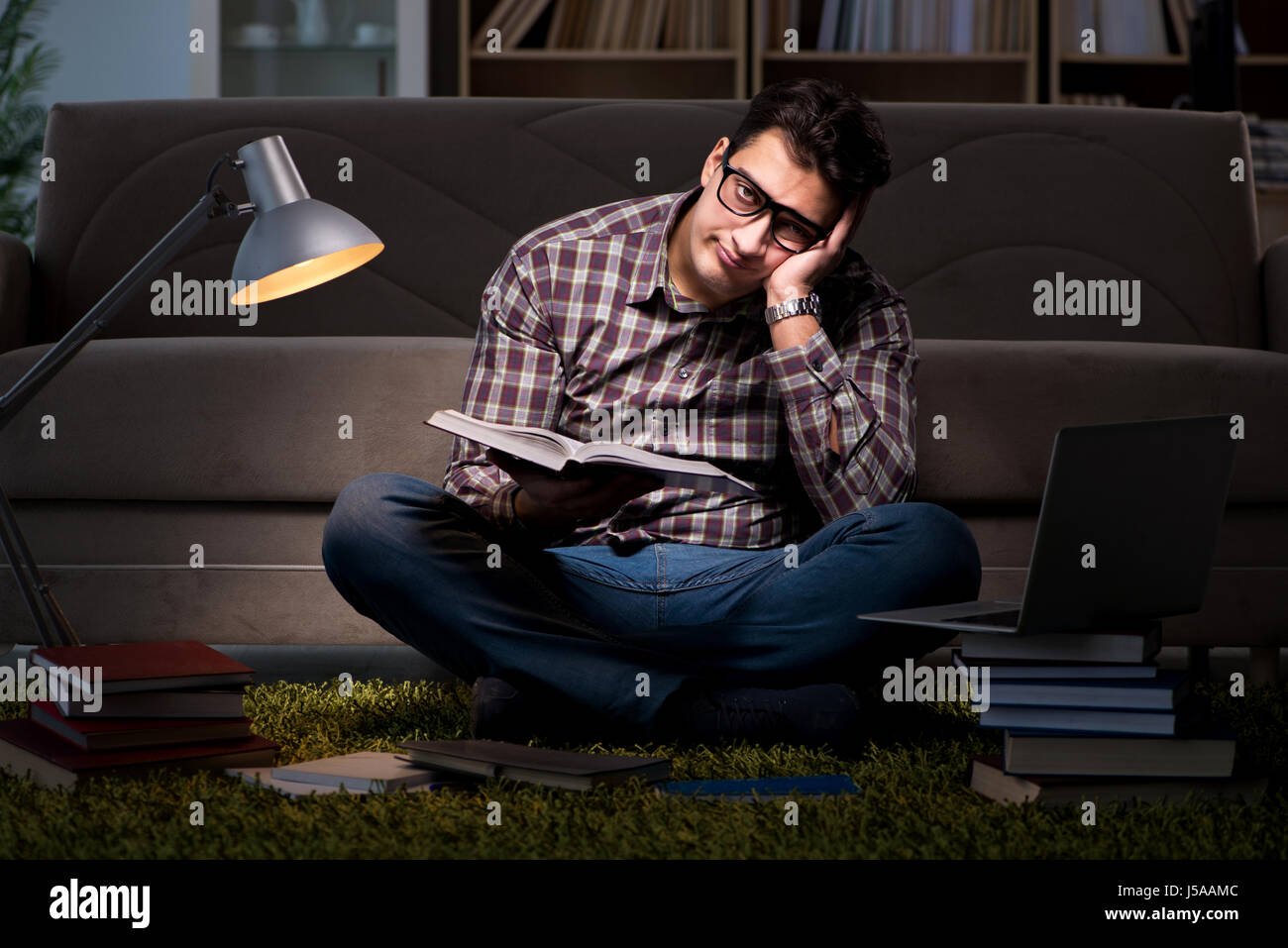 Student reading books preparing for exams Stock Photo - Alamy