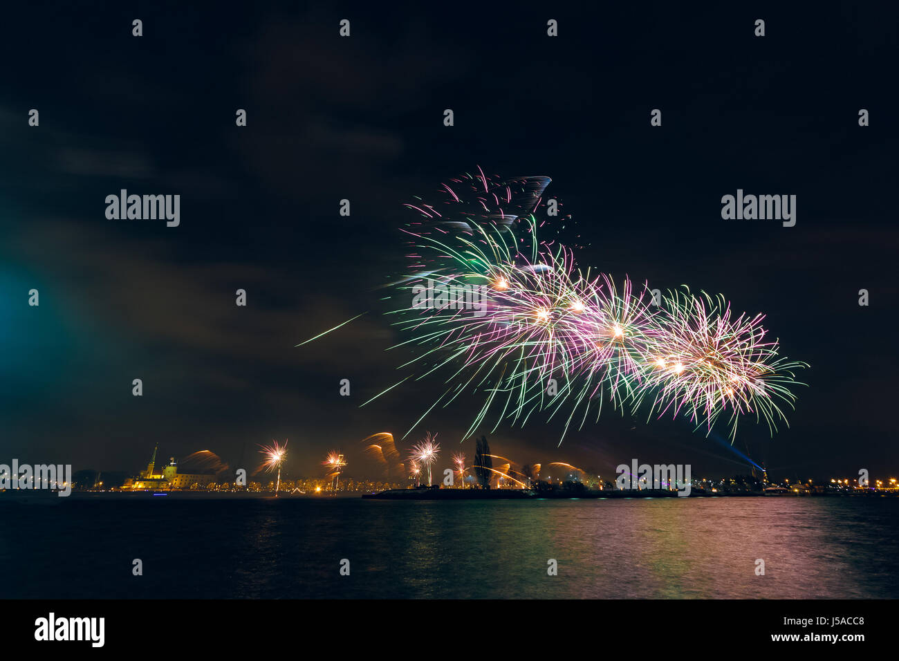 Colored New Year fireworks in centre of Riga Stock Photo - Alamy
