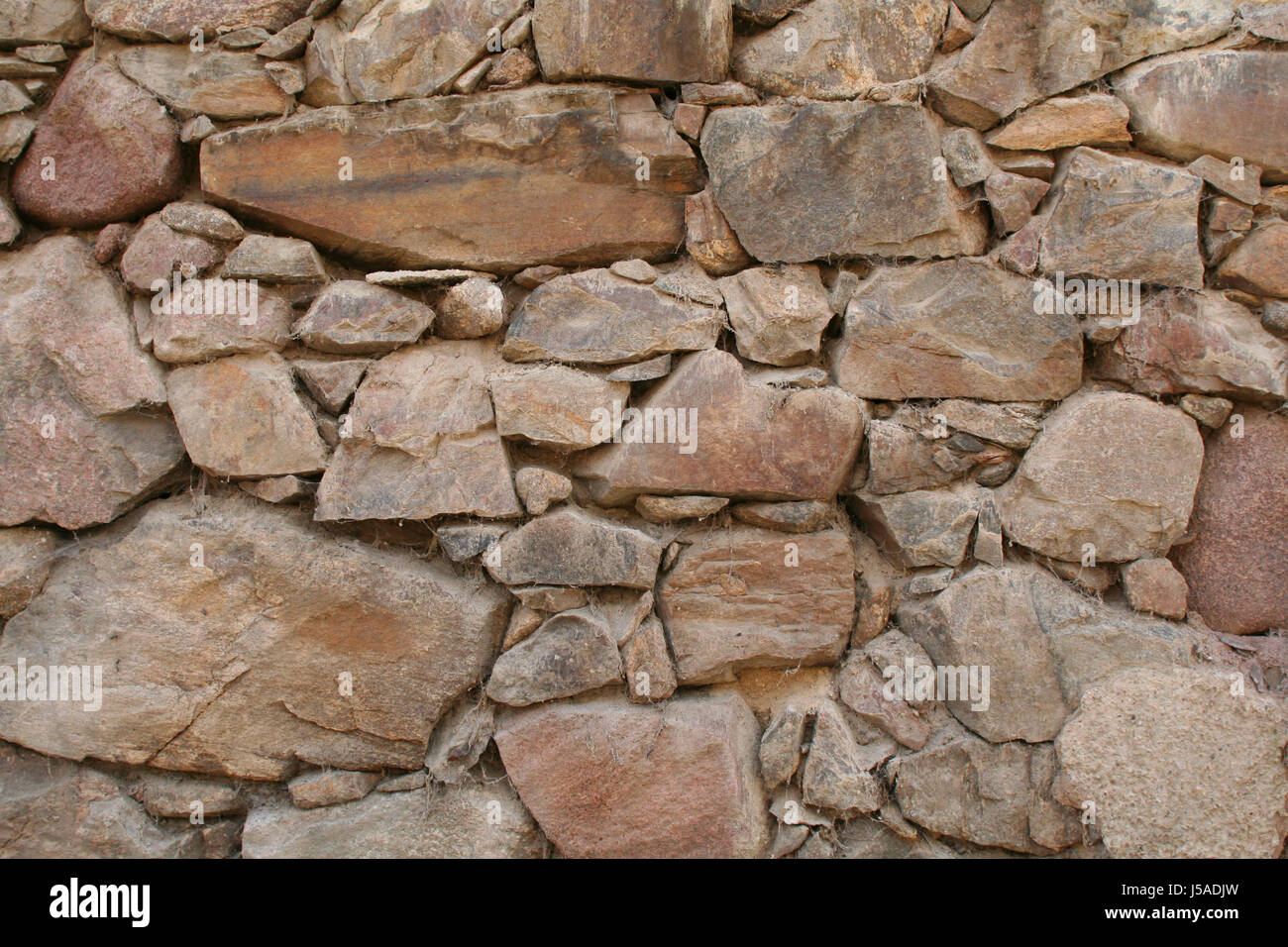 wall reddish masonry weatherworn expiry date expire rubble natural ...