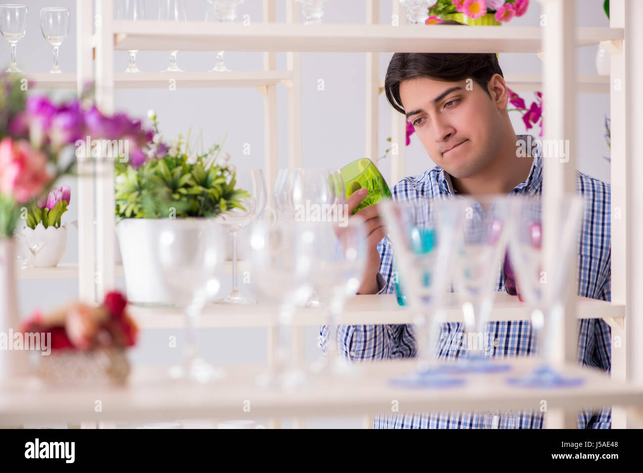 Young handsome man shopping in shop Stock Photo - Alamy