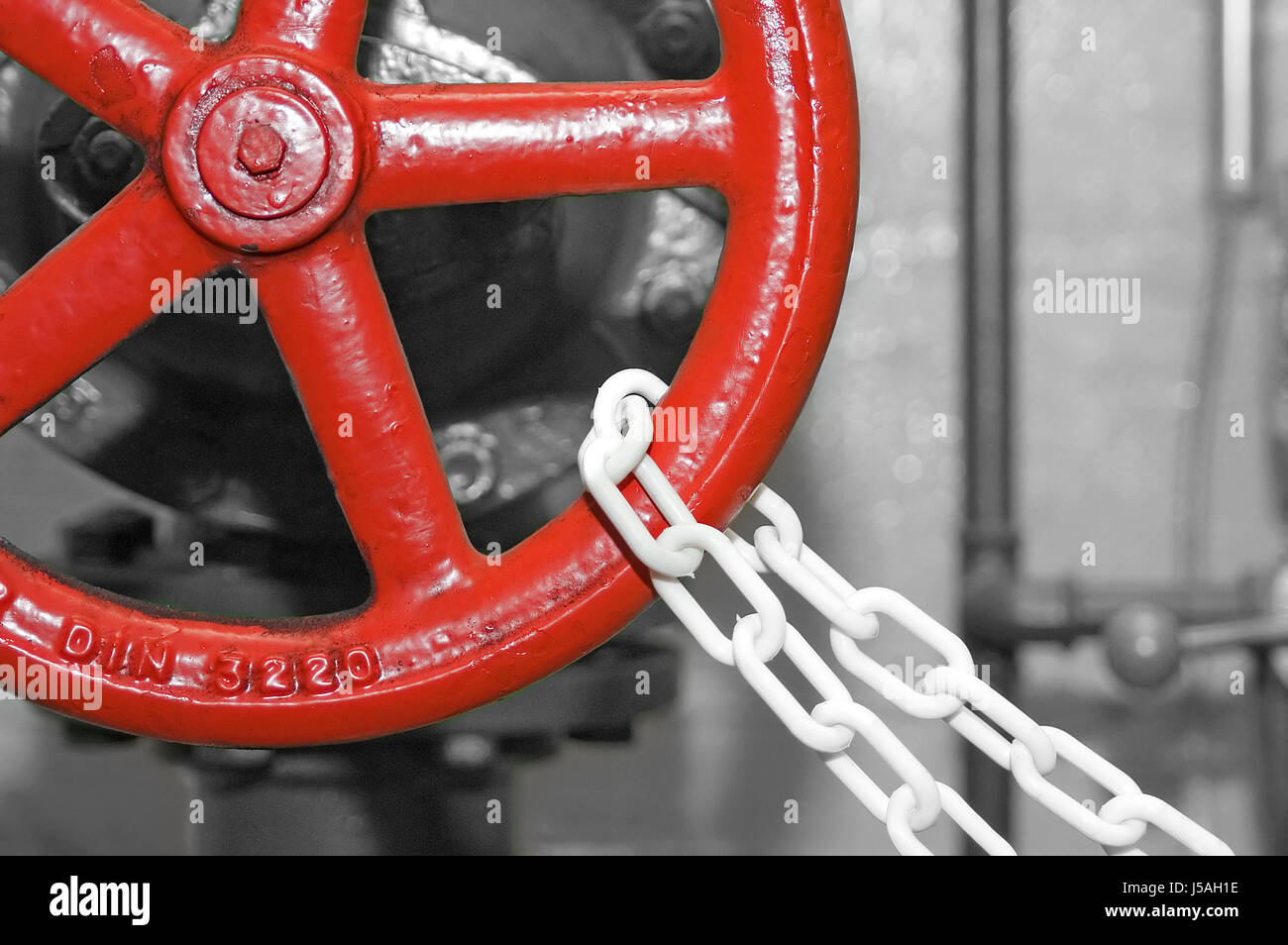 blue chain barrier water pipes junction limbs valve wangler arm stop ...