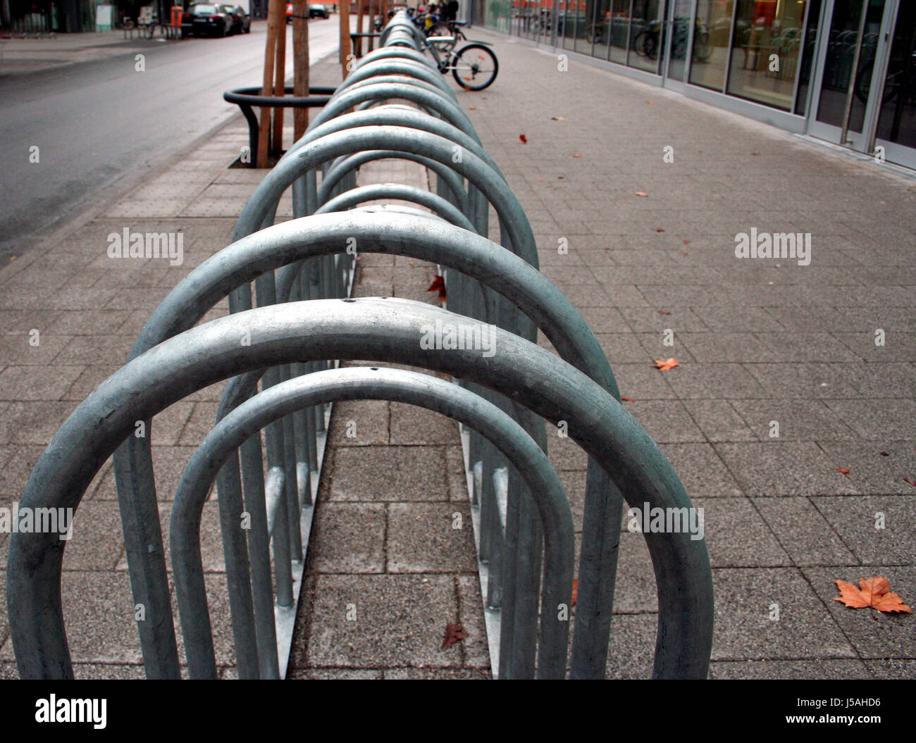 city town silver steel metal pavement rods parking linkage street road ...