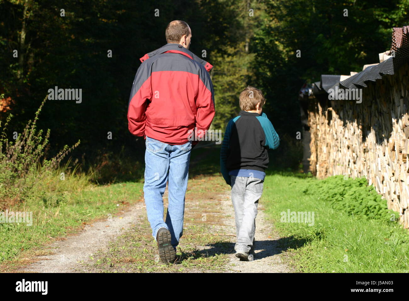 The father was the example for the son hi-res stock photography and ...
