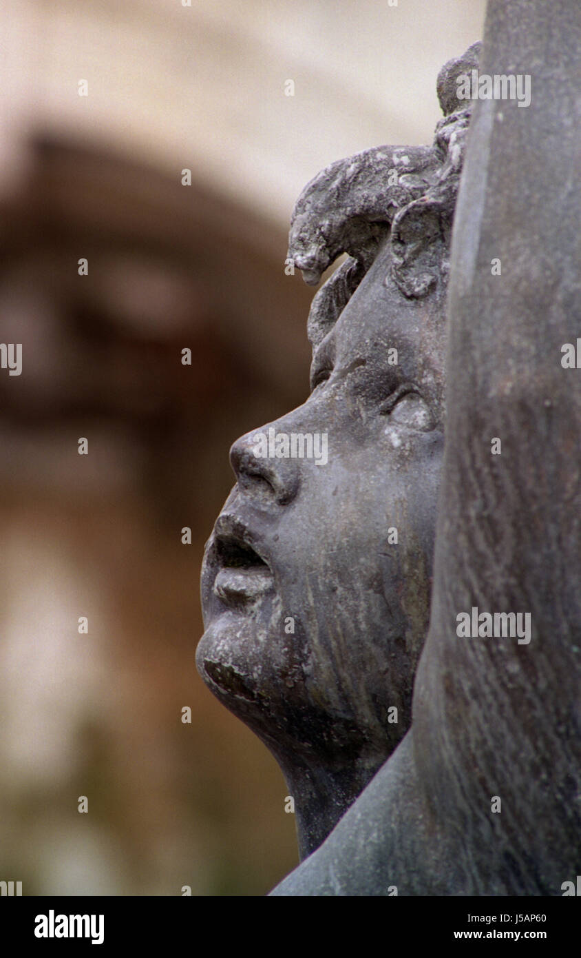 face sculpture angel angels munich fountain bronze boy lad male ...