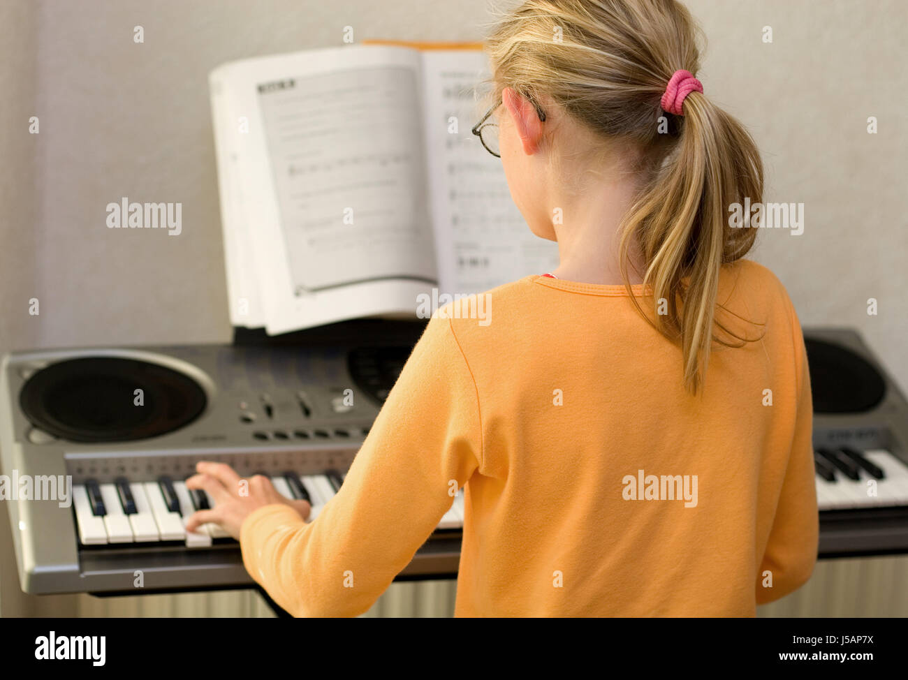 child playing keyboard Stock Photo - Alamy