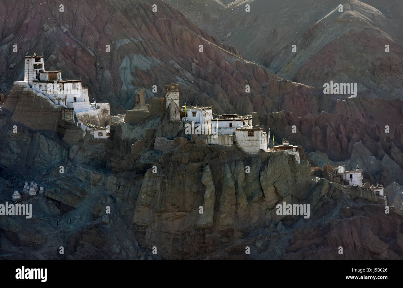 The white building of the ancient Buddhist Tibetan monastery of Basgo ...