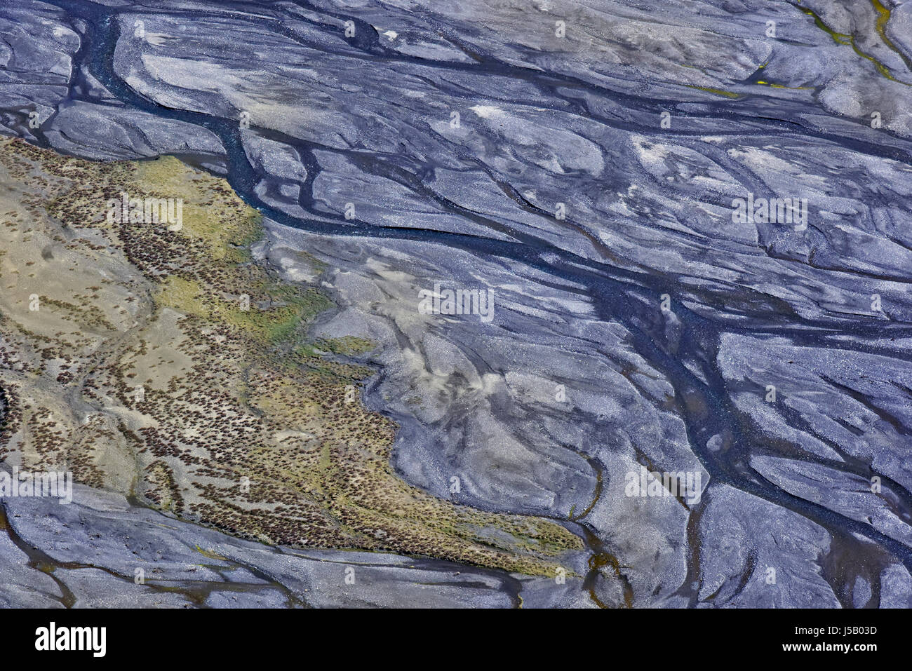 The valley is a high-mountain river, photographed from a great height ...