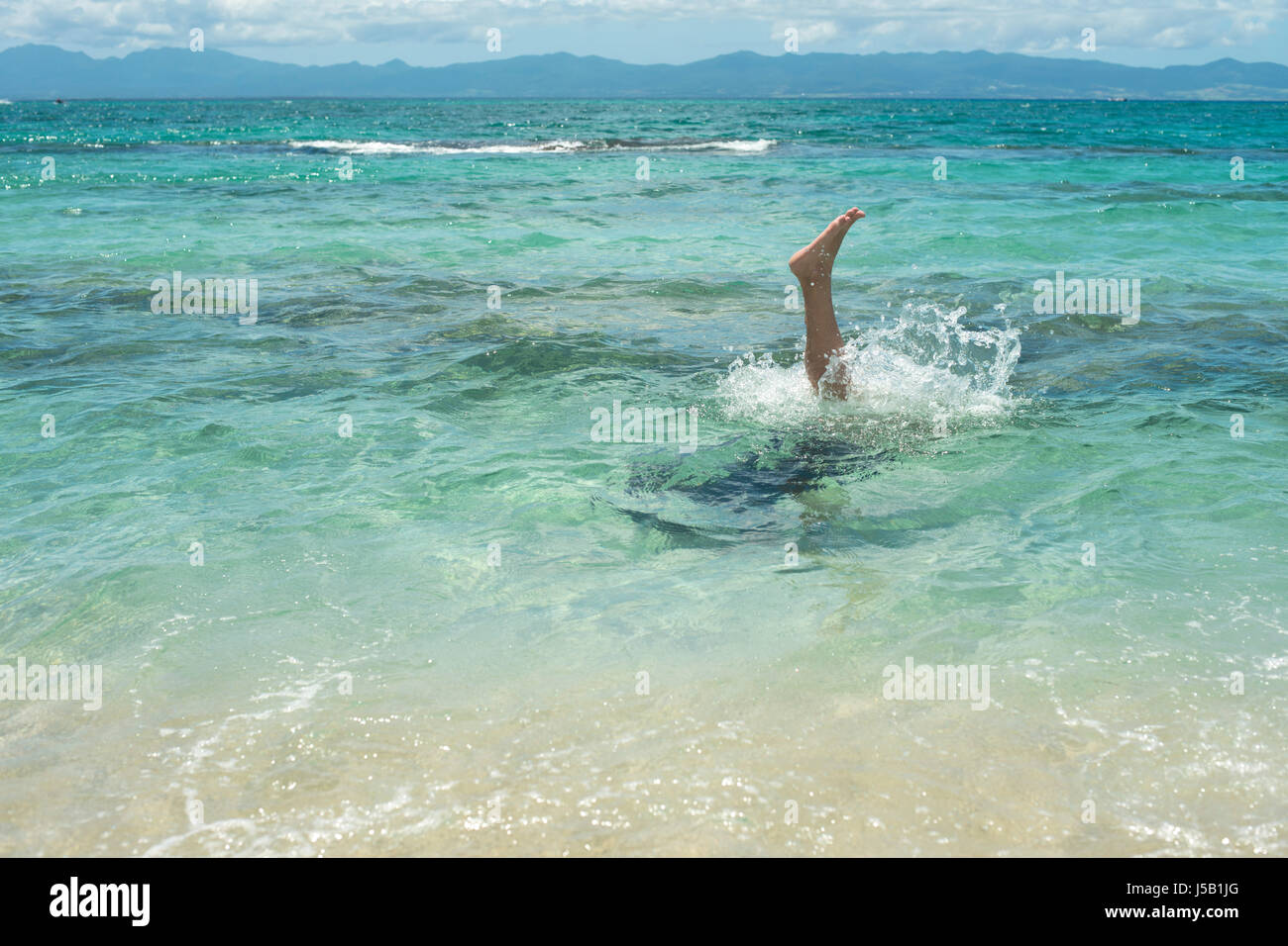 Diving water legs hi-res stock photography and images - Alamy