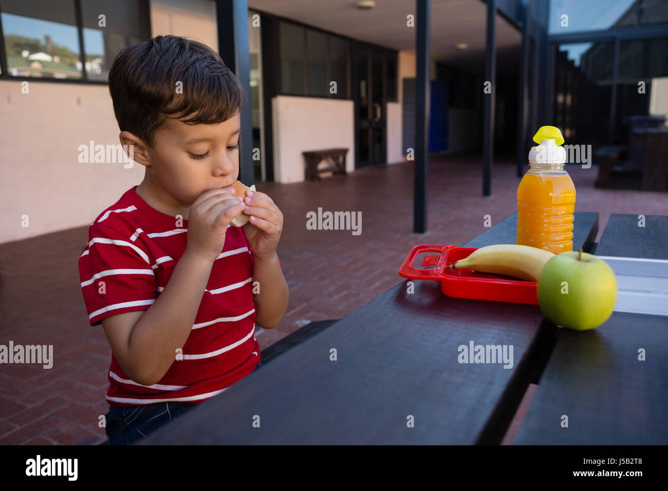 Child tablet table eating hi-res stock photography and images - Alamy