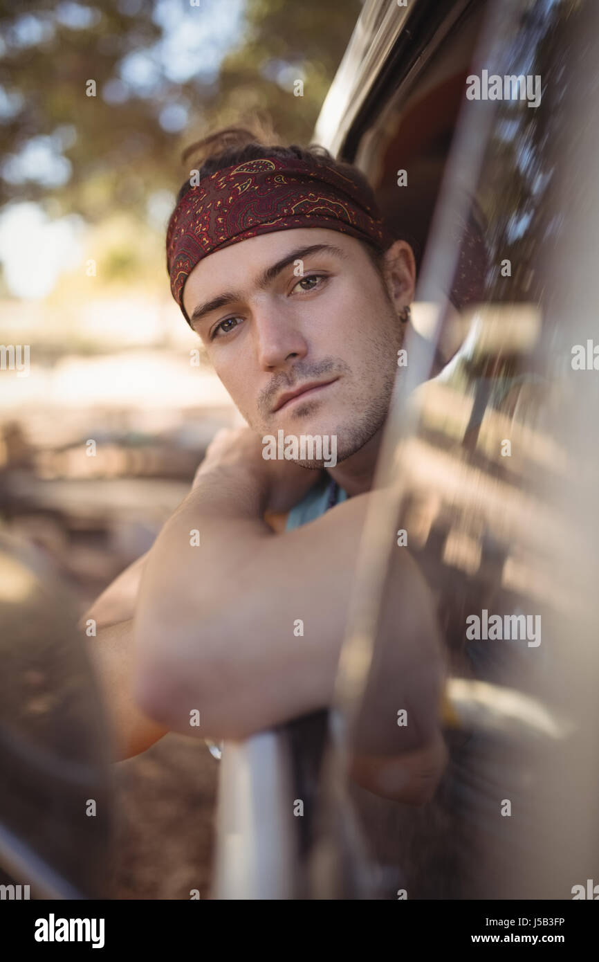 Portrait of young man driving van Stock Photo - Alamy