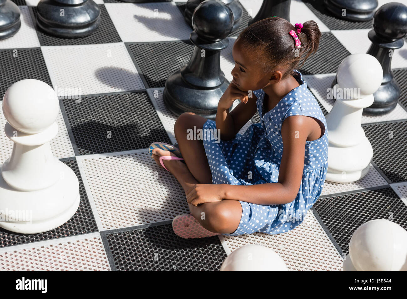 Girl sitting on gate hi-res stock photography and images - Alamy