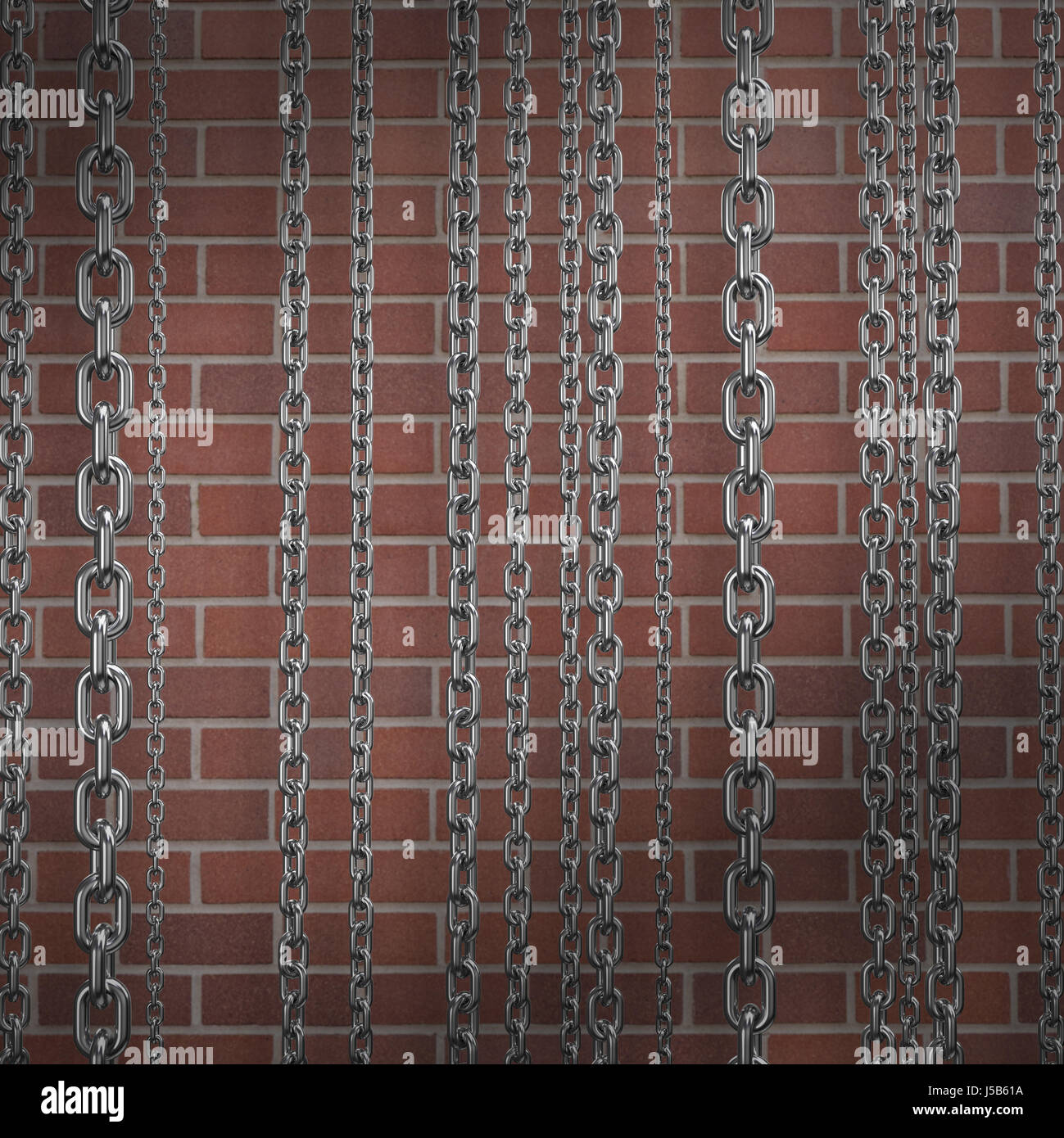 Row of silver metallic chains against full frame shot of wall Stock ...