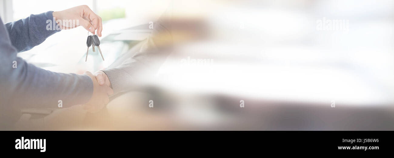 People shaking each other hands while holding keys Stock Photo - Alamy