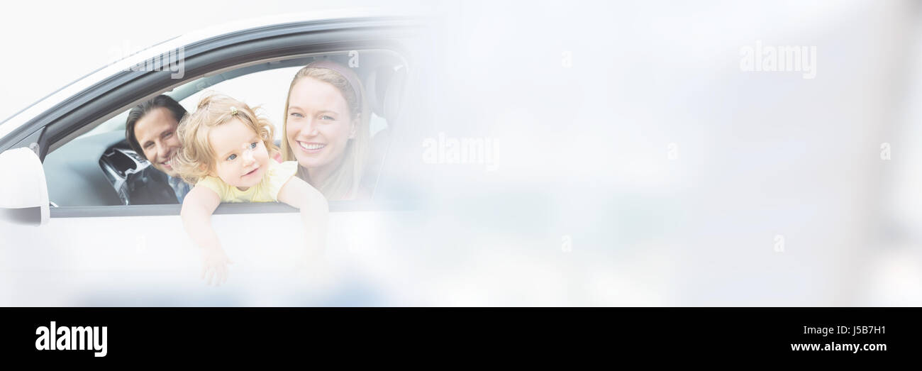 Parents and baby on drive while sitting in car Stock Photo - Alamy