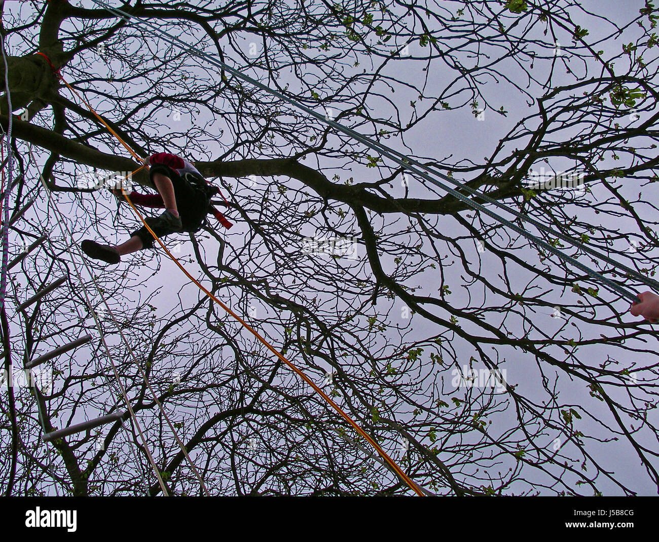 Down child abseiling hi-res stock photography and images - Alamy
