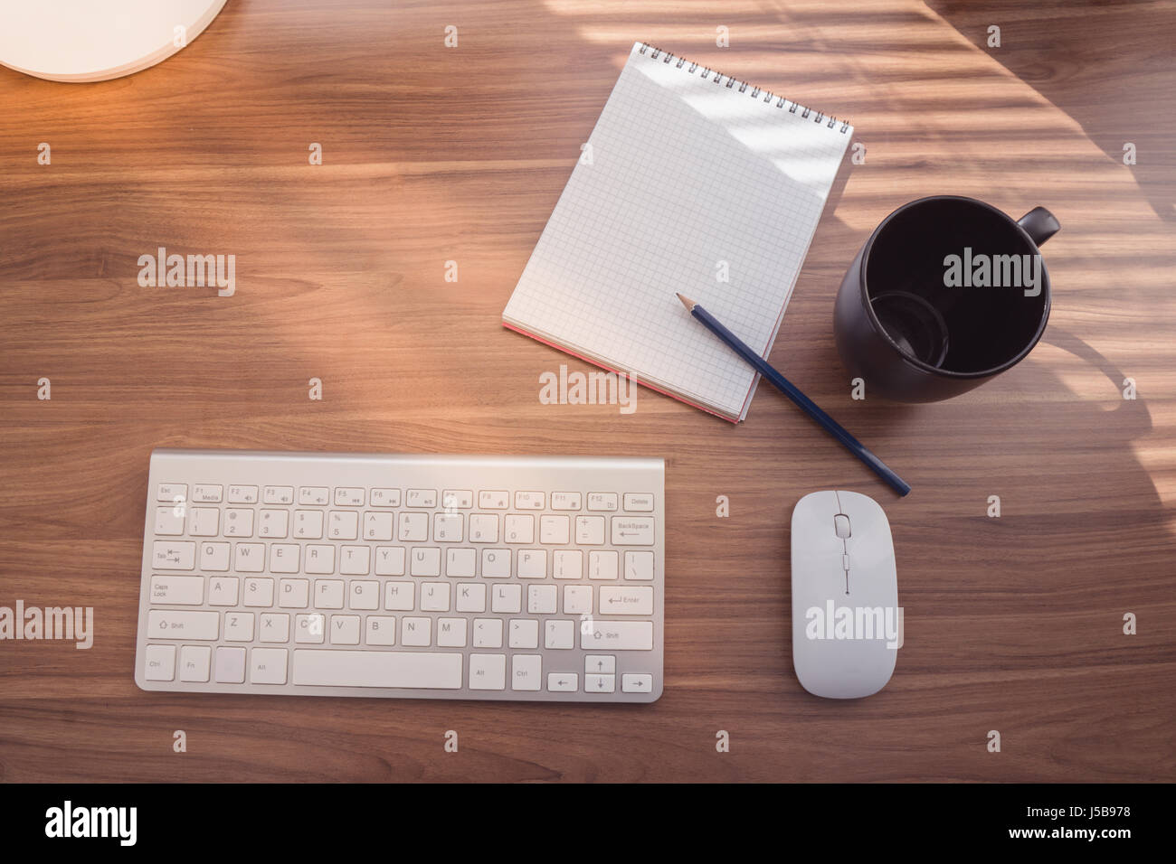 Top view of office wooden table with stationary Stock Photo - Alamy