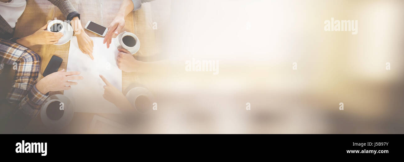 Friends discussing and drinking coffee at coffee shop Stock Photo - Alamy