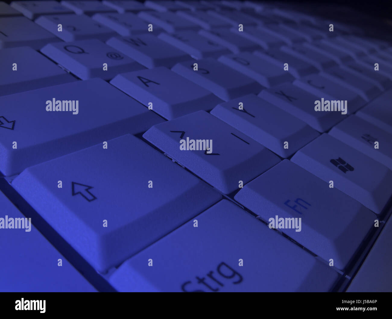 blue laptop notebook computers computer keyboard macro close-up macro ...