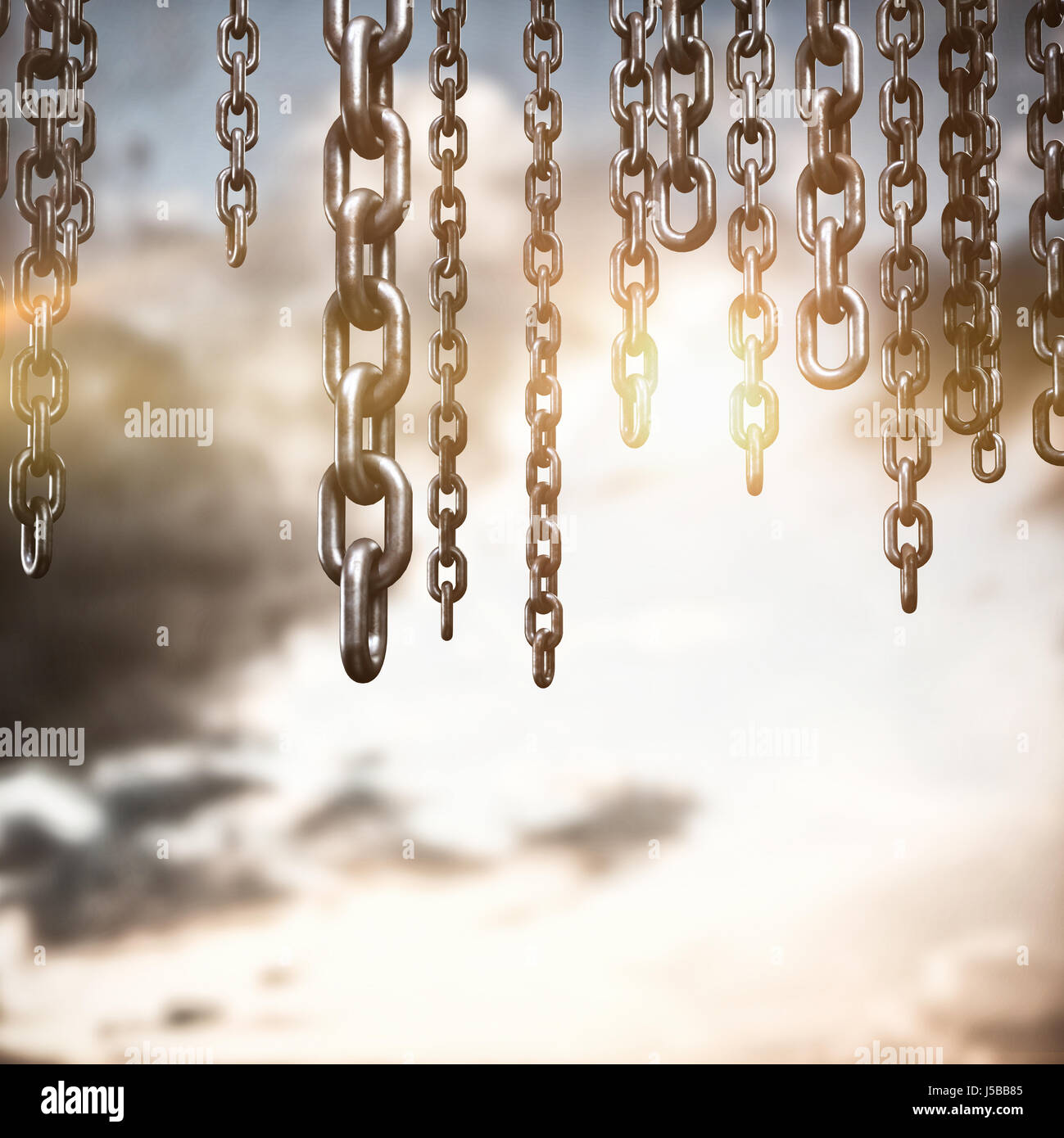 3d image of chains hanging against blue and orange sky with clouds ...
