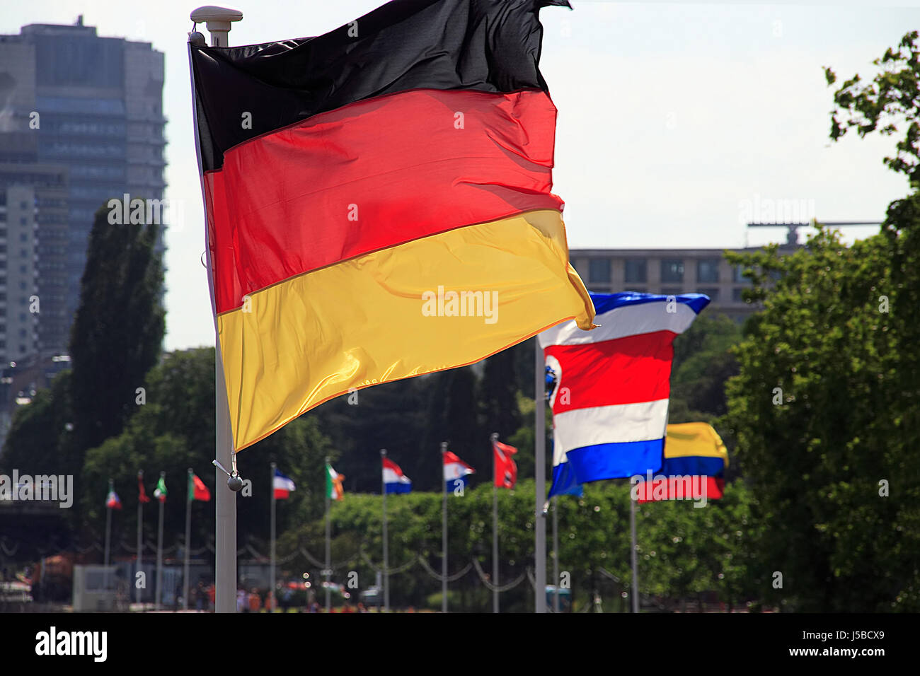 german flag in the wind Stock Photo - Alamy