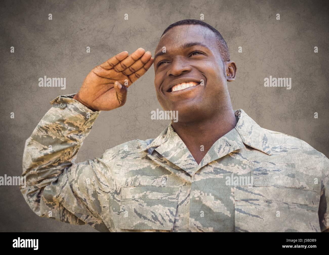 Digital composite of Soldier smiling and saluting against brown ...