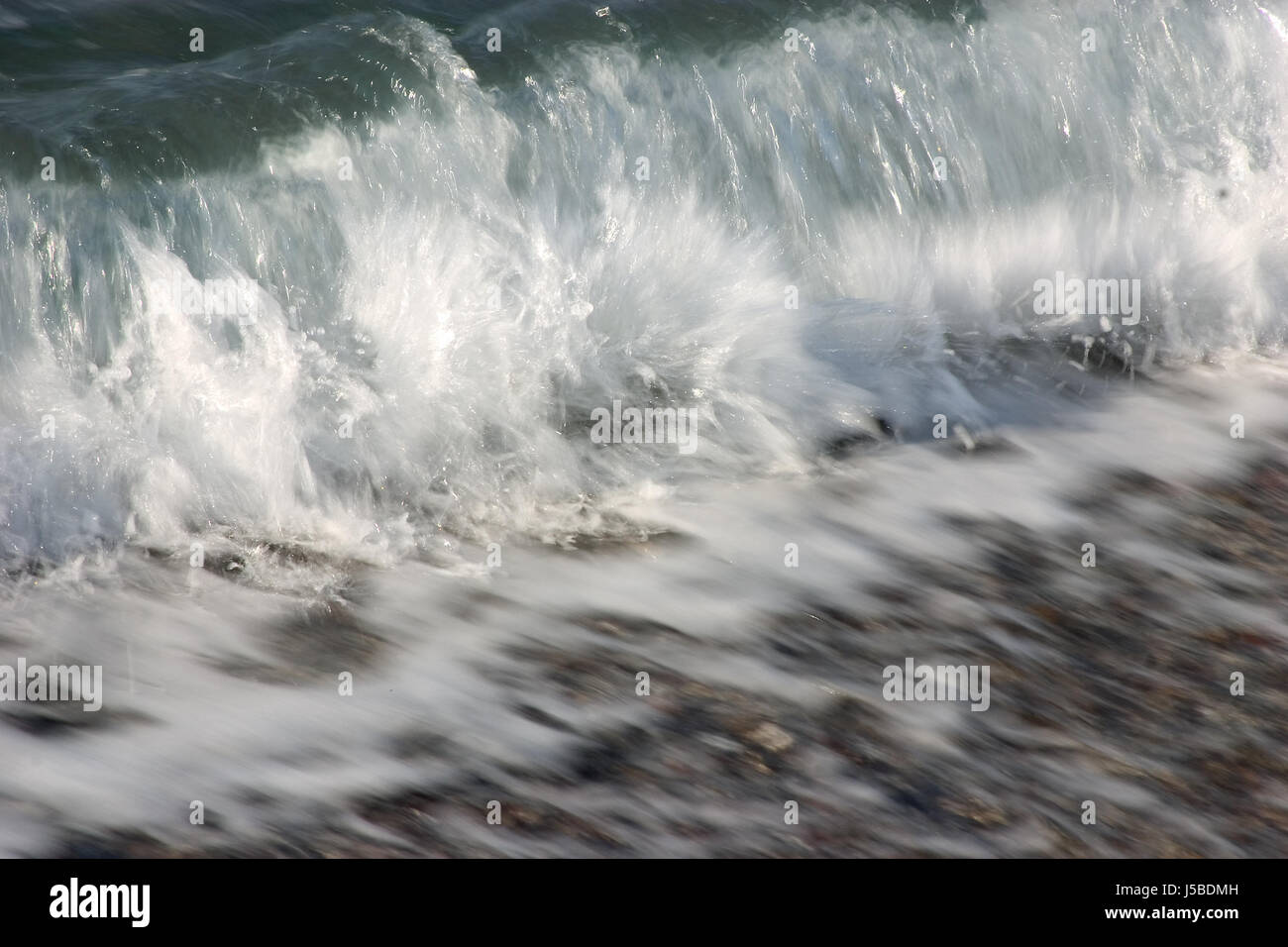 foam wave precipitate spray break split flash over crest water ...