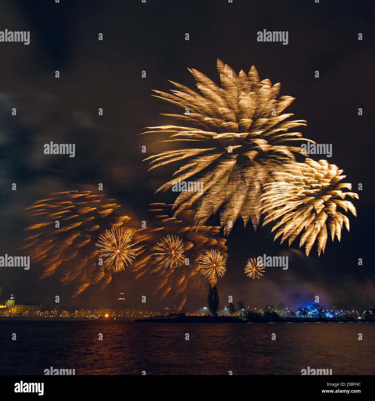 Colored New Year fireworks in centre of Riga Stock Photo - Alamy