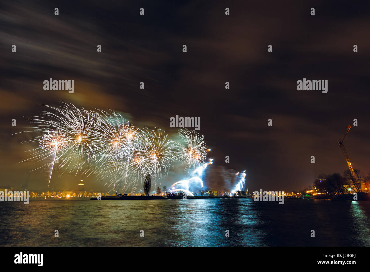 Colored New Year fireworks in centre of Riga Stock Photo - Alamy