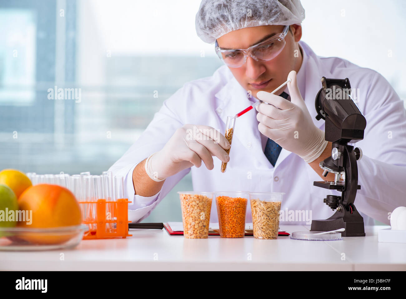 Nutrition expert testing food products in lab Stock Photo - Alamy