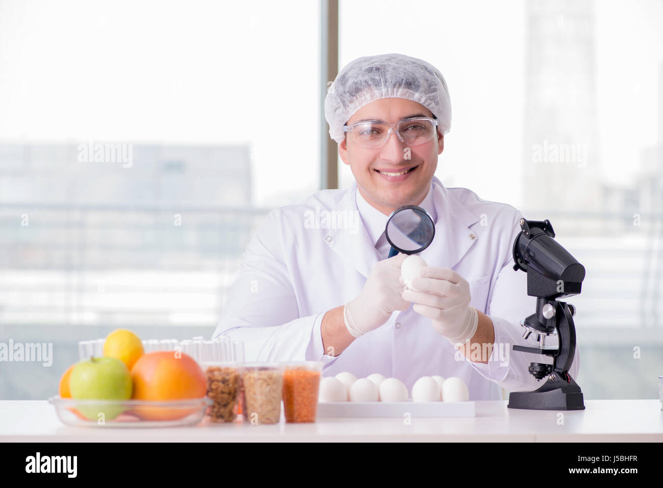 Nutrition expert testing food products in lab Stock Photo - Alamy