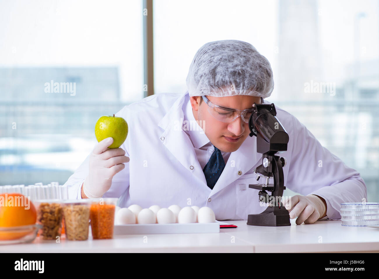 Nutrition expert testing food products in lab Stock Photo - Alamy