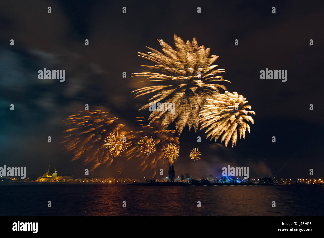 Colored New Year fireworks in centre of Riga Stock Photo - Alamy
