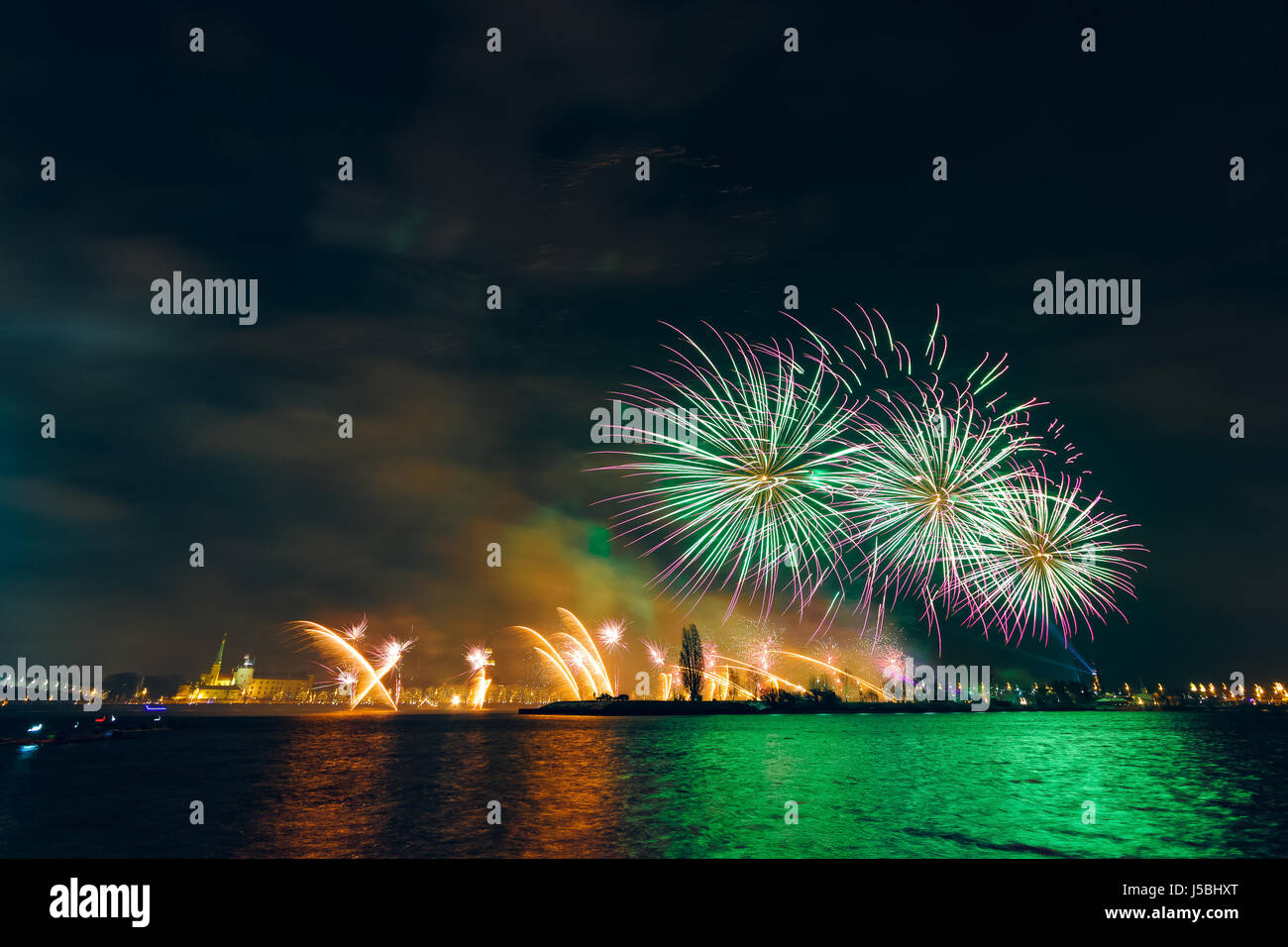 Colored New Year fireworks in centre of Riga Stock Photo - Alamy