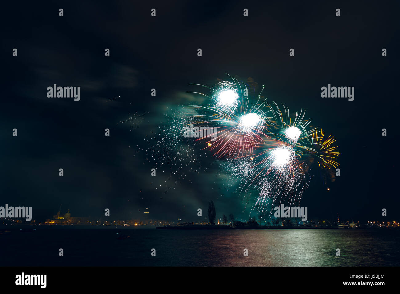 Colored New Year fireworks in centre of Riga Stock Photo - Alamy