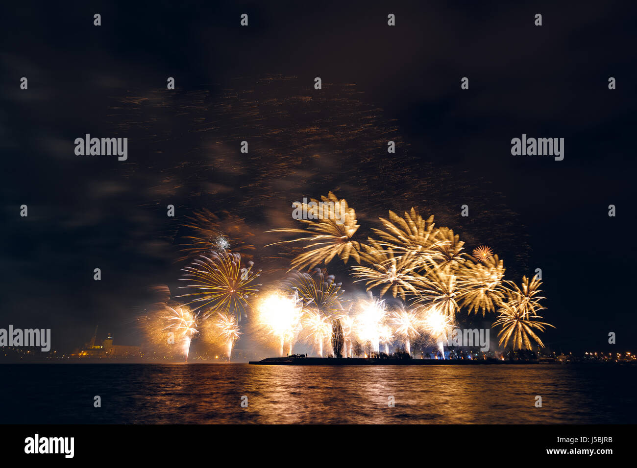 Colored New Year fireworks in centre of Riga Stock Photo - Alamy