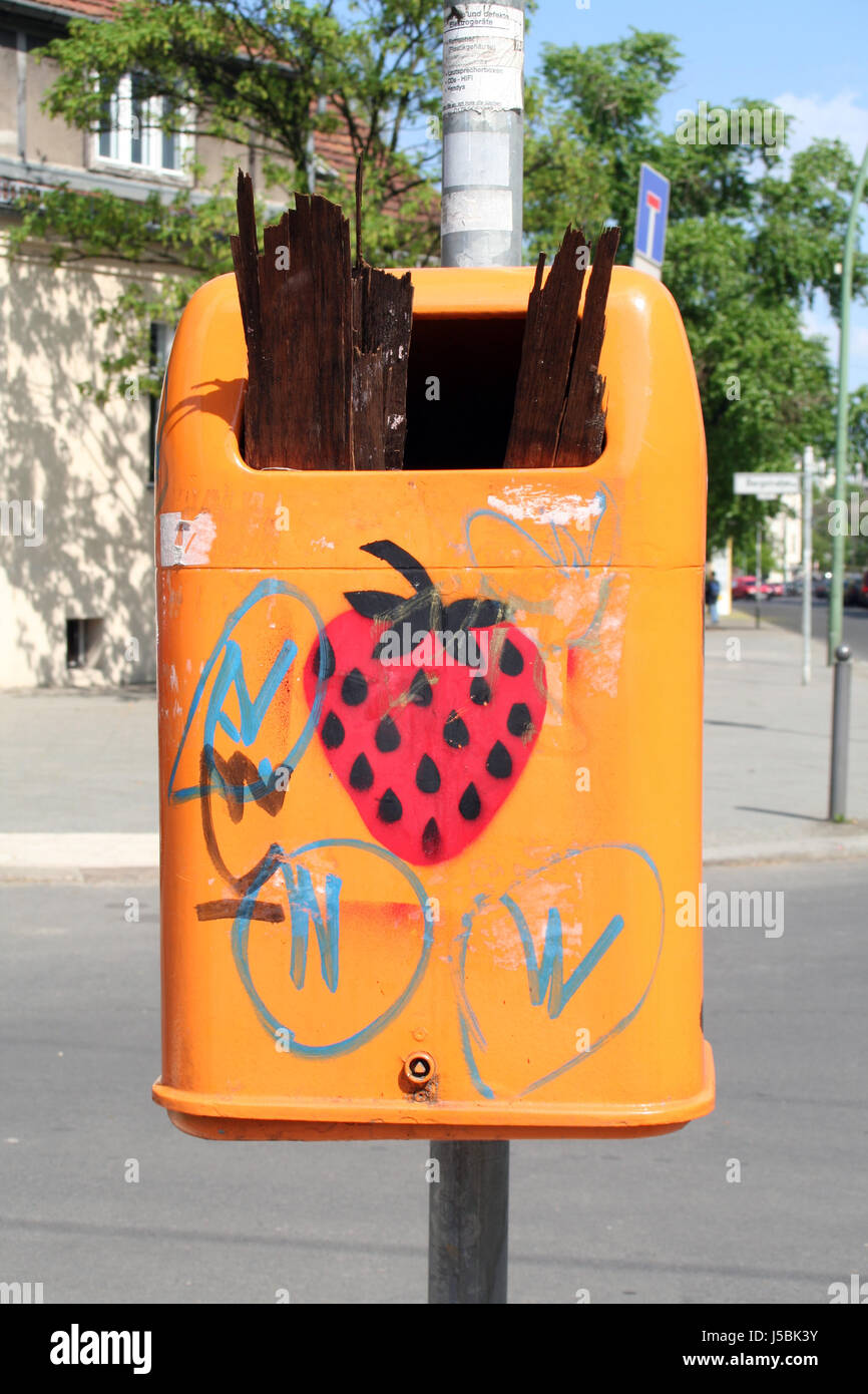berlin garbage can strawberry painted orange besmeared queer curious ...