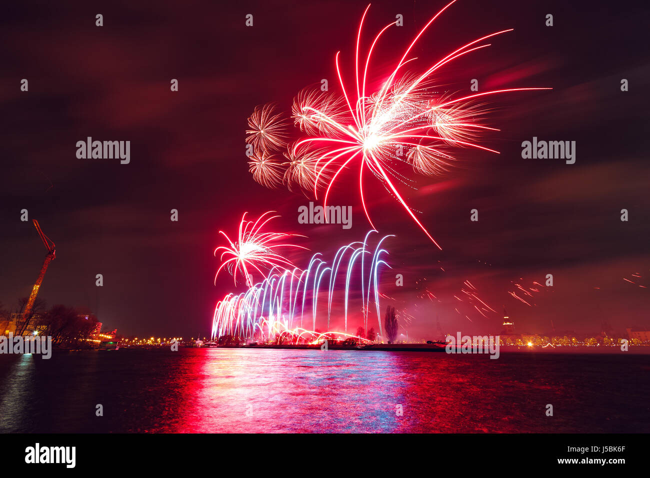 Colored New Year fireworks in centre of Riga Stock Photo - Alamy