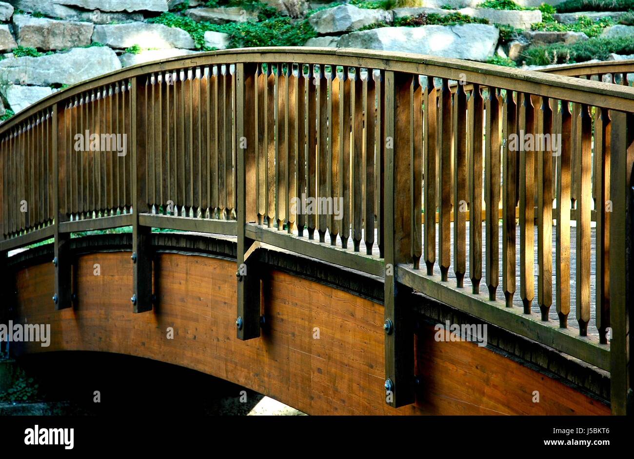 park wood brown brownish brunette bridge arc sunlight railing arcs ...
