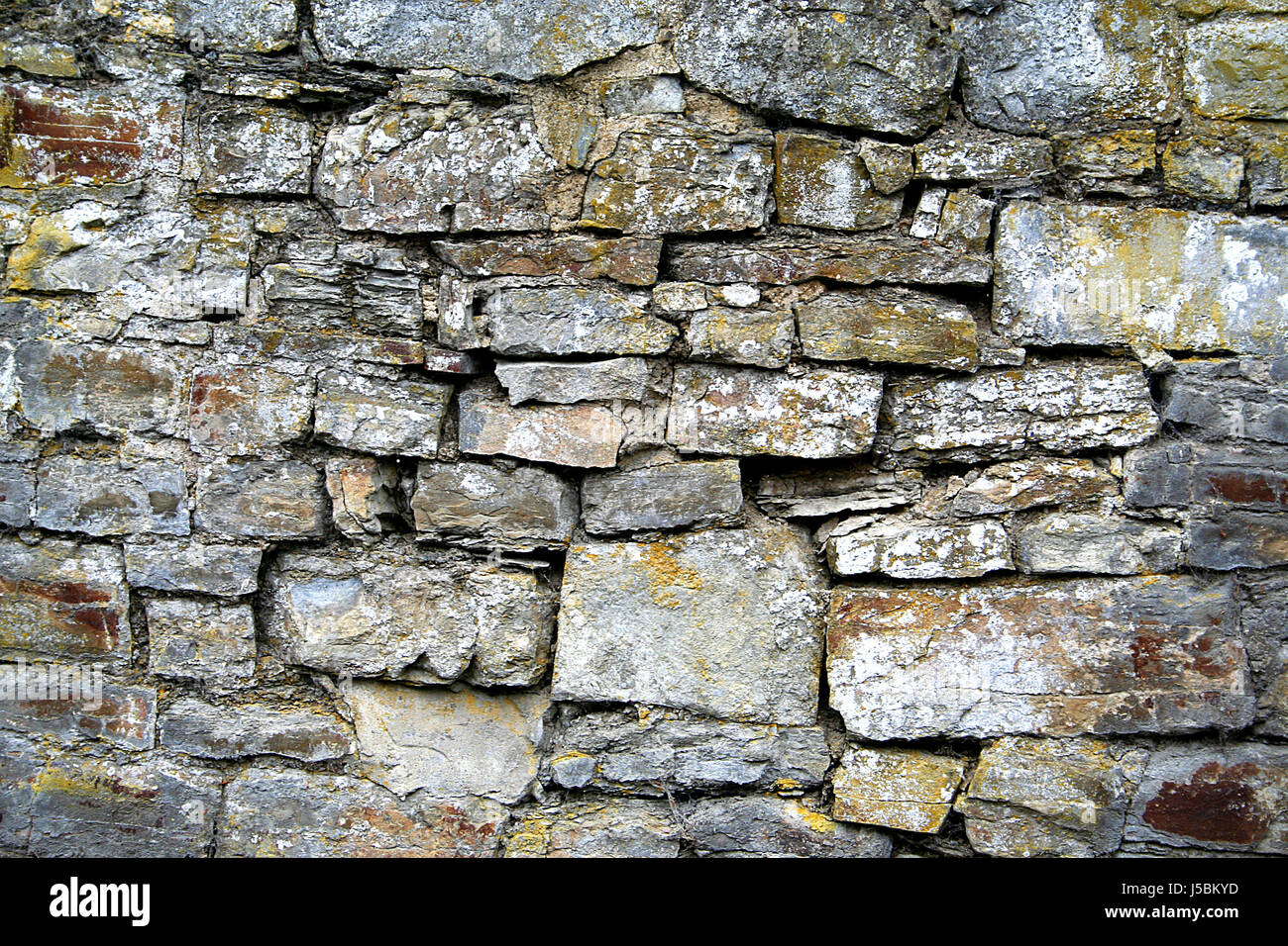 historical antique wall metalled very old stratified rubble stones old ...