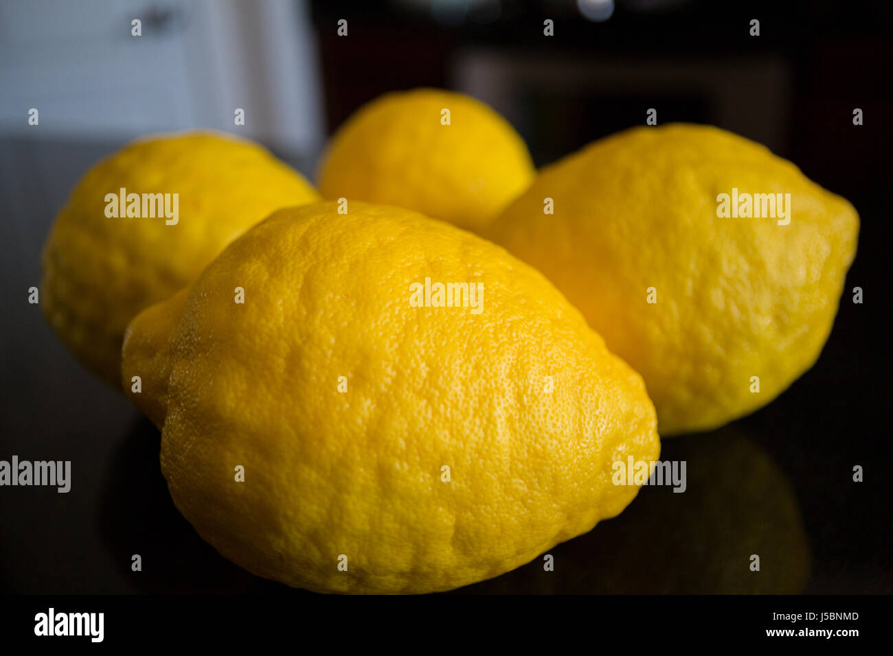 Large Yellow Lemons On A Table Stock Photo - Alamy