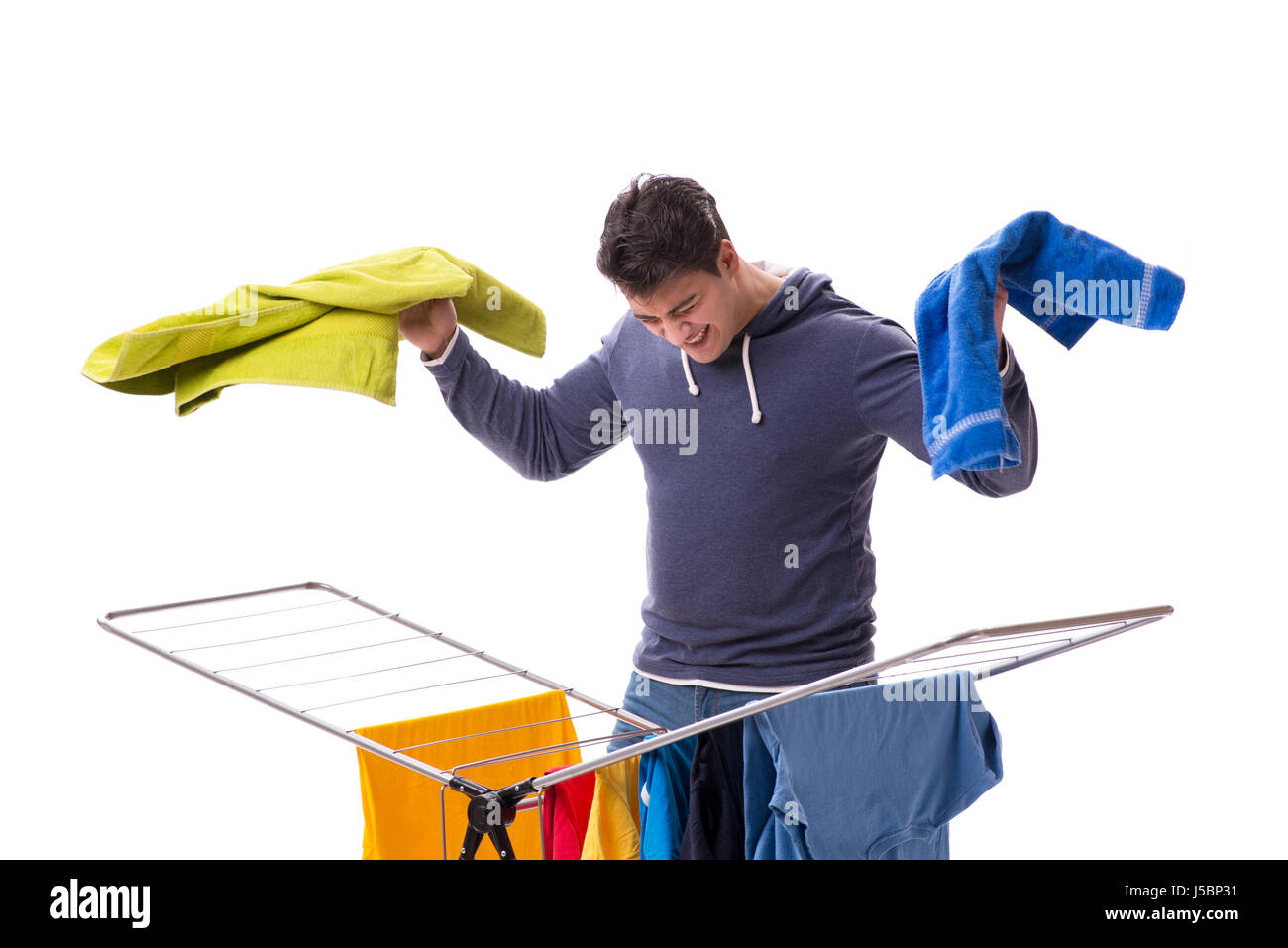 Husband man doing laundry isolated on white Stock Photo - Alamy