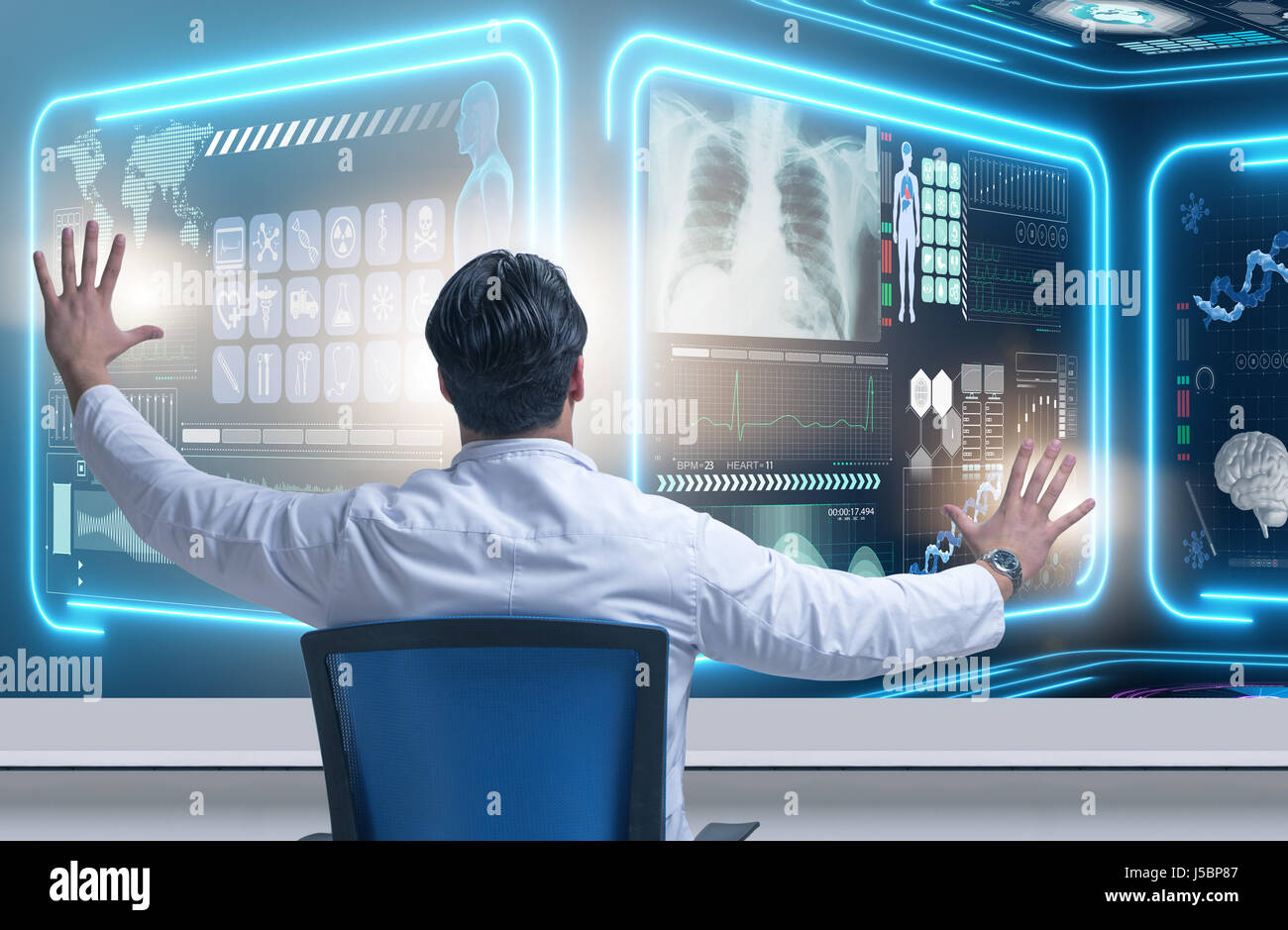 Male doctor in futuristic medical concept Stock Photo - Alamy