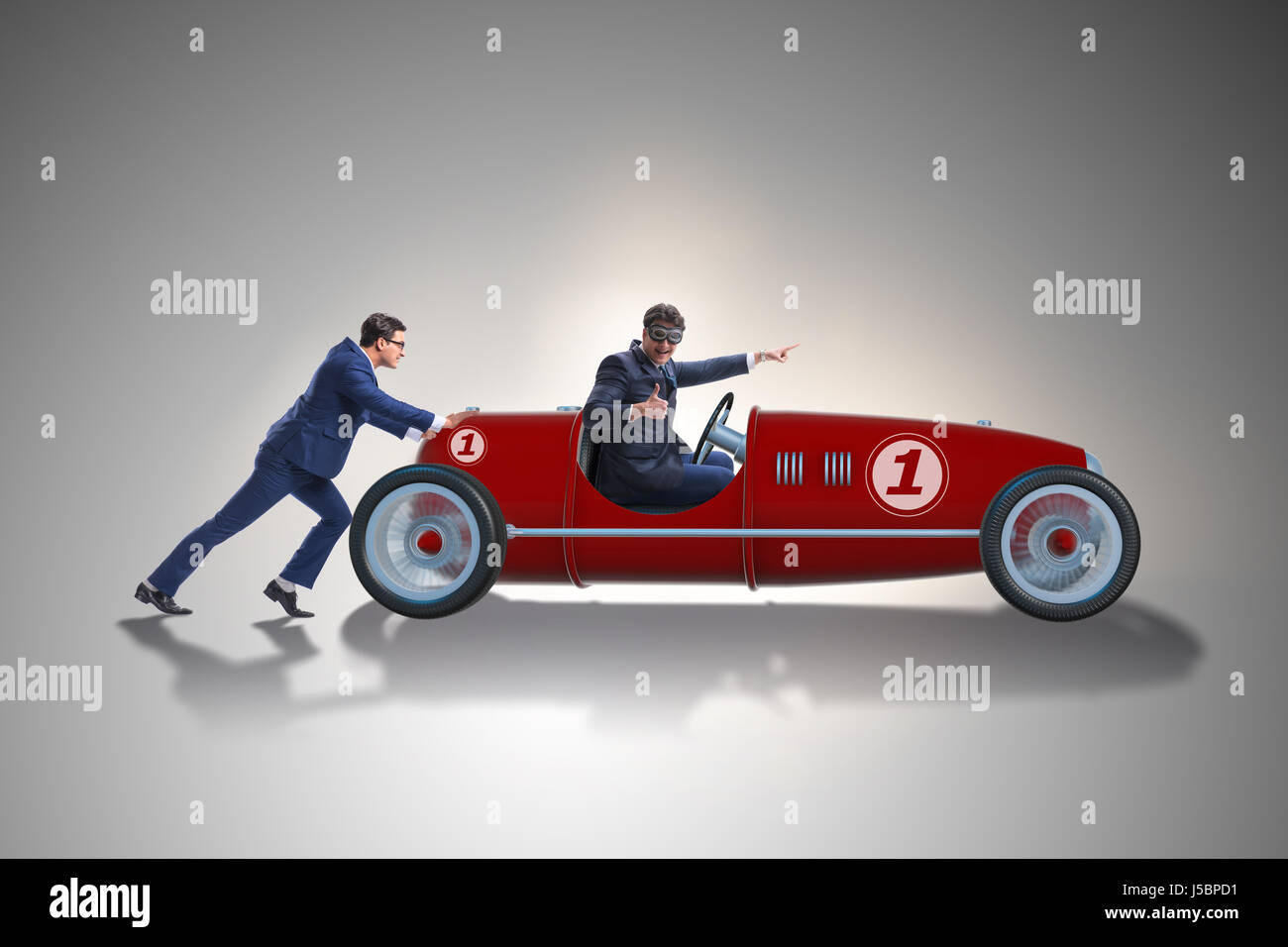 Businessman car pushing in teamwork concept Stock Photo - Alamy